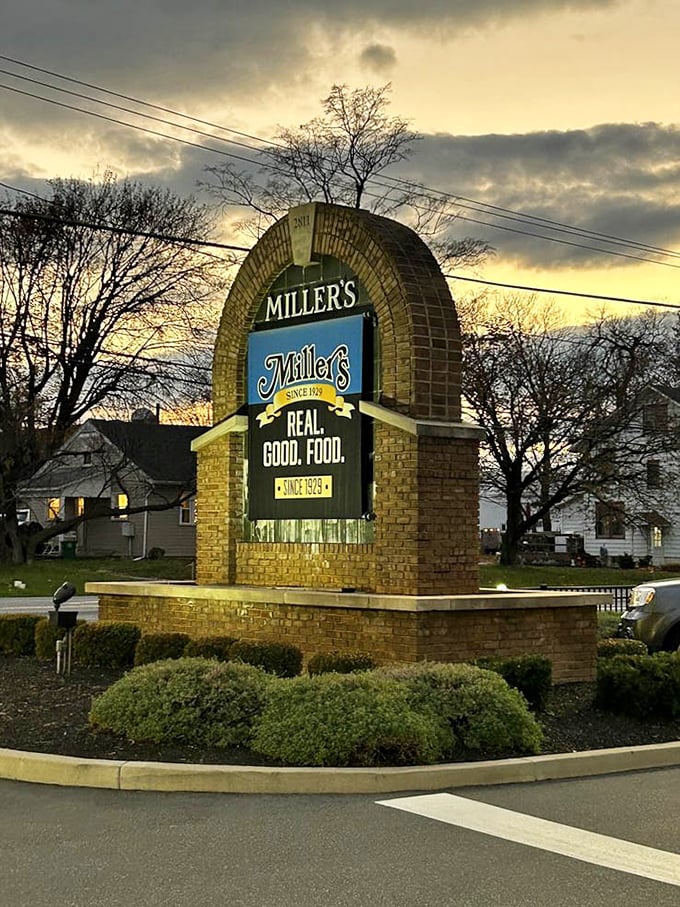 Miller's iconic sign stands sentinel against the twilight sky, promising "REAL. GOOD. FOOD." with a confidence that's entirely justified.