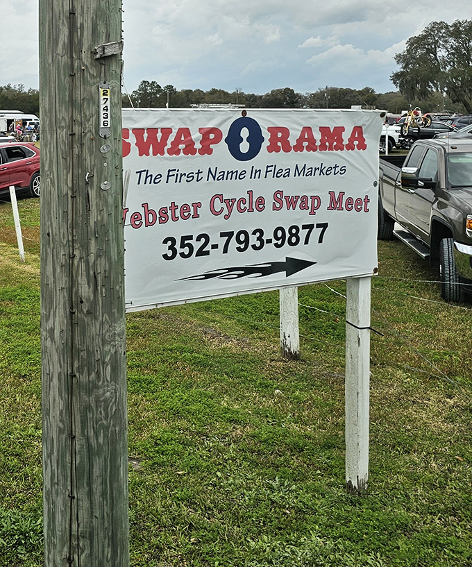 The sign says it all—"The First Name in Flea Markets" isn't just branding; it's a promise of the bargain bonanza that awaits beyond.