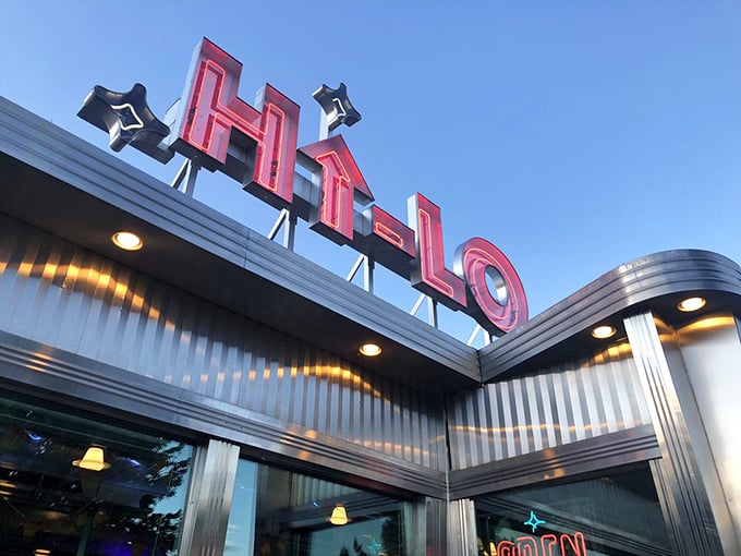 That neon sign doesn't just announce a restaurant—it promises an experience. Hi-Lo glows like a pink beacon in the Minneapolis twilight.