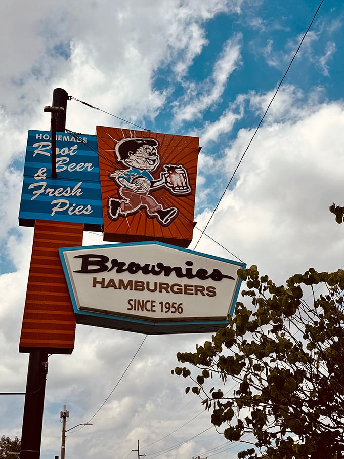 That vintage sign against an Oklahoma sky—a beacon of burger hope that's been guiding hungry travelers through changing times with unchanging quality.
