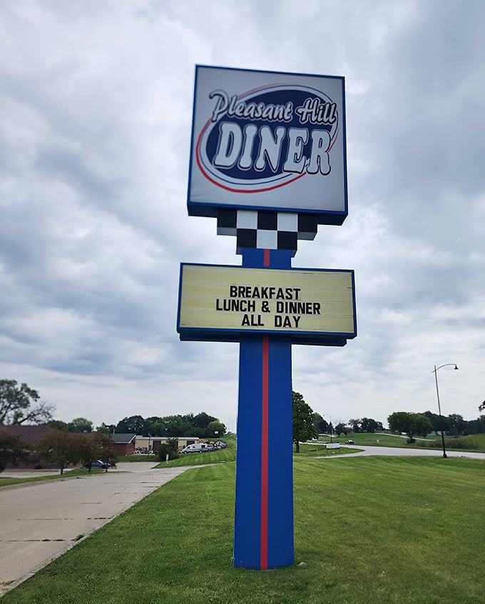 The sign says it all – breakfast, lunch, and dinner served with genuine Midwestern hospitality daily.