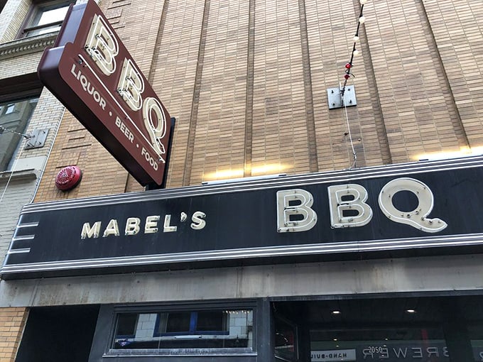 That sign glows like a beacon of hope for anyone within sniffing distance of this barbecue mecca.