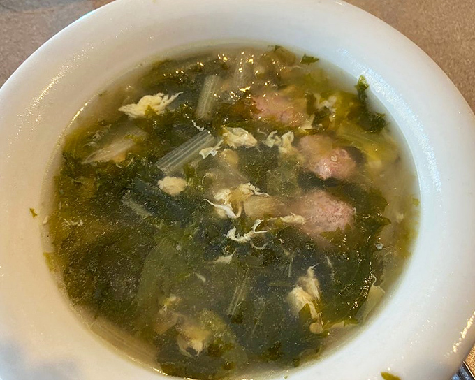 Wedding soup with those tiny meatballs playing hide-and-seek in the broth. This is the soup equivalent of comfort television—familiar but never boring.