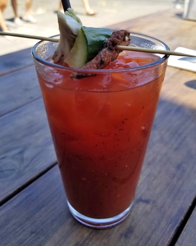 This Bloody Mary doesn't just come with a garnish—it arrives with an entire snack, perfect for those "Is it breakfast or lunch?" moments.