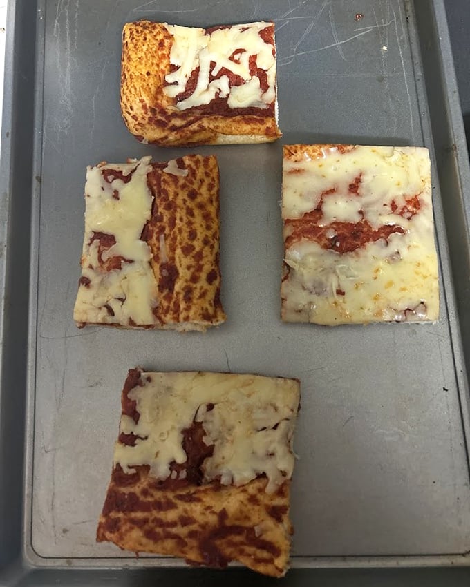 These square pizza slices prove that bakeries in Pennsylvania don't just do sweet—they understand savory satisfaction just as well.