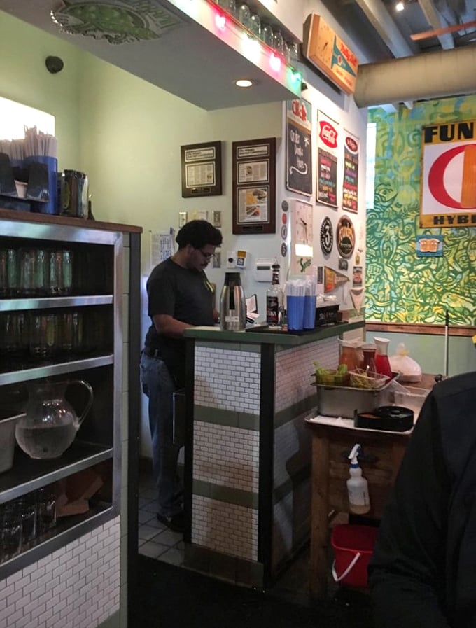 Behind the scenes, the staff orchestrates breakfast magic at a counter that balances efficiency with old-school charm. The vintage-inspired decor isn't trying—it just is.
