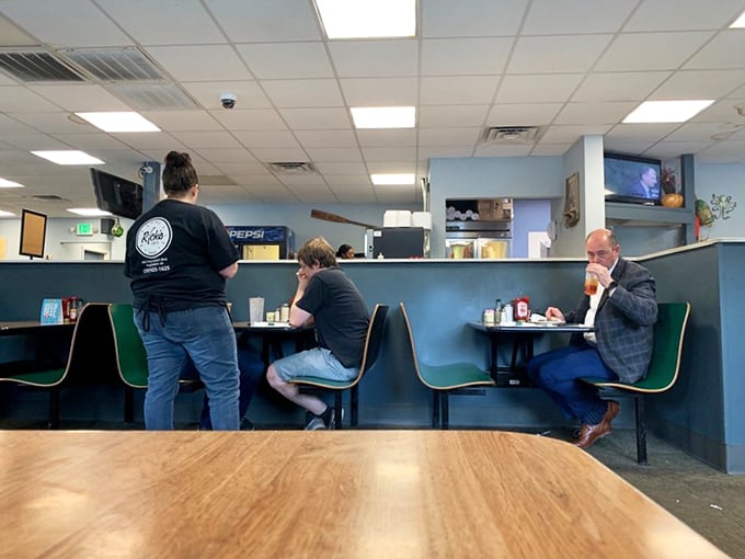 Where magic happens—the dining area at Rick's offers the perfect blend of privacy and community, with staff who remember your order.