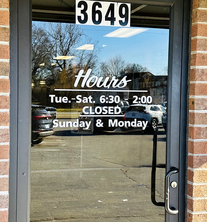 The hours posted clearly – Tuesday through Saturday, 6 to 2 – creating a schedule around which locals plan their entire week.