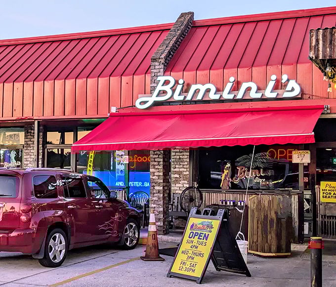 That "OPEN" sign might as well say "OPPORTUNITY" – a chance to experience what locals have known for years about this unassuming seafood sanctuary.