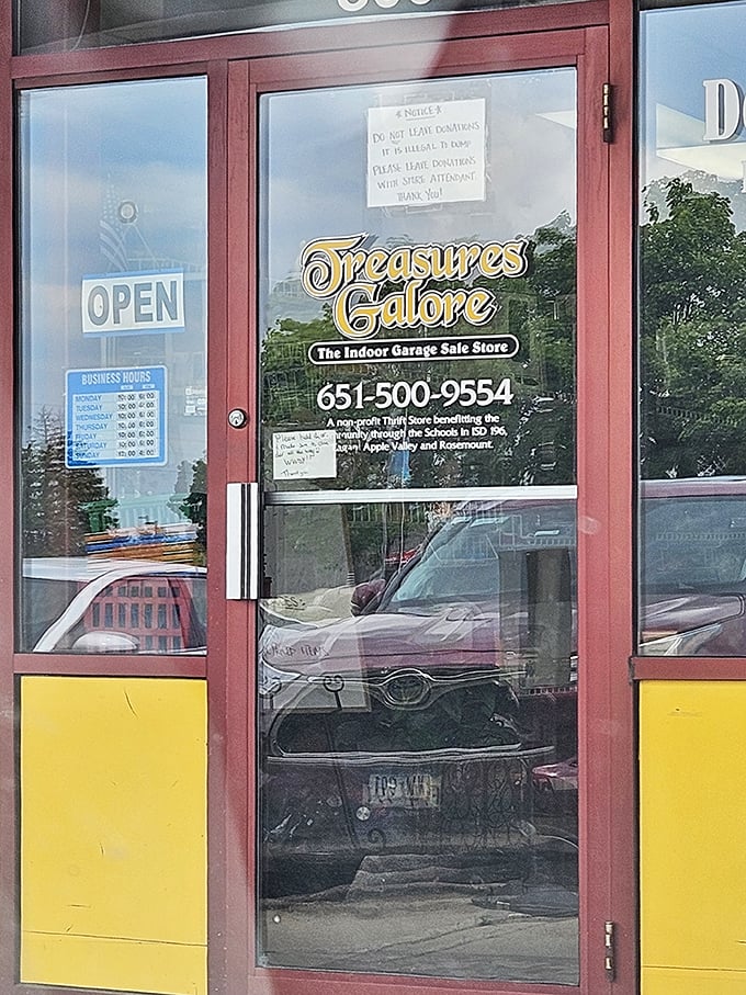 The front door reveals Treasures Galore's true identity—a non-profit thrift store benefiting local schools. Shopping with purpose!