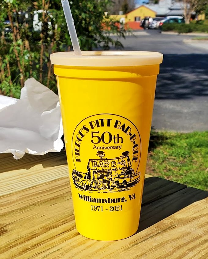 The iconic yellow cup of sweet tea – so sweet it could almost be dessert – bearing the proud mark of 50 years of barbecue tradition.