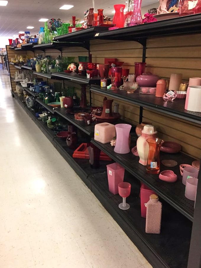 Color-coordinated vases create an ombré effect that would make any interior designer swoon—from emerald green to blush pink, all awaiting fresh flowers.