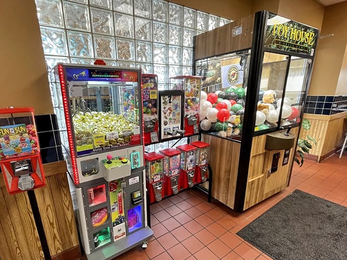 Every great diner needs a corner of childhood joy—where quarters turn into memories between bites of pancakes.