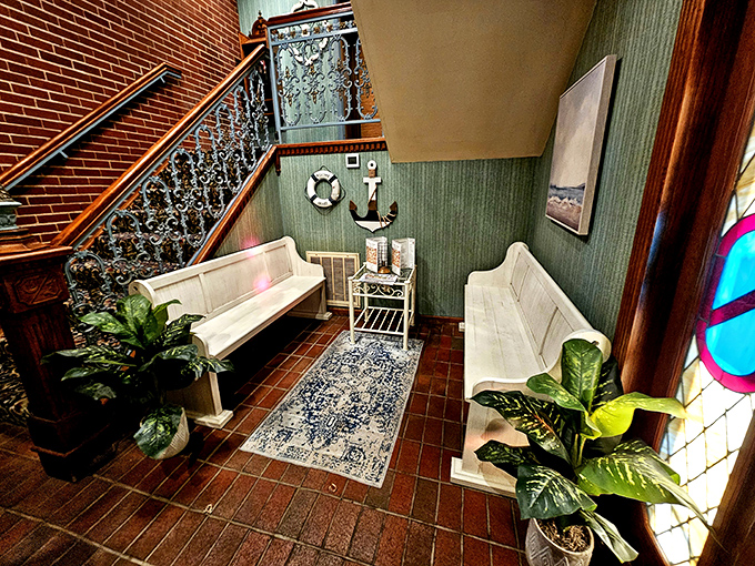 The waiting area feels like your fancy aunt's sitting room—where nautical touches remind you of the seafood treasures awaiting beyond those wooden doors.