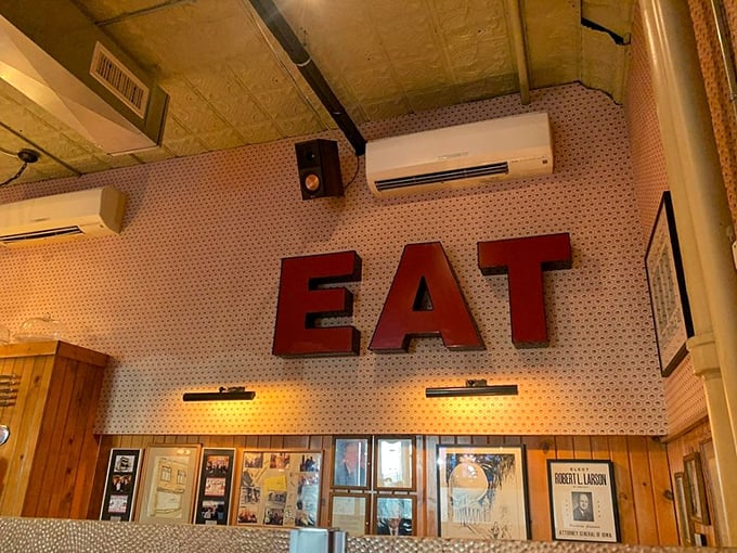 The "Wall of Presidents" showcases Hamburg Inn's status as an Iowa political landmark where candidates come to kiss babies and eat pie shakes.
