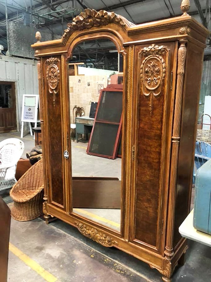 This isn't just a wardrobe; it's practically architectural—the kind of piece that makes you rearrange your entire home just to accommodate its grandeur.