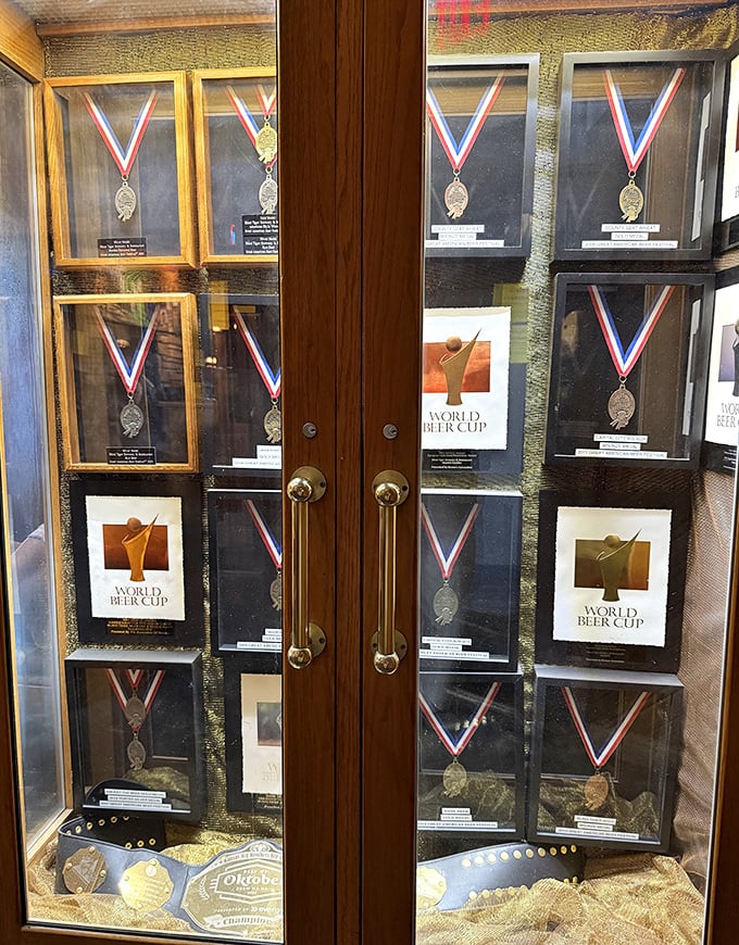 Hardware that speaks volumes. These medals aren't just decorations—they're proof that world-class beer happens in unexpected places like Topeka.