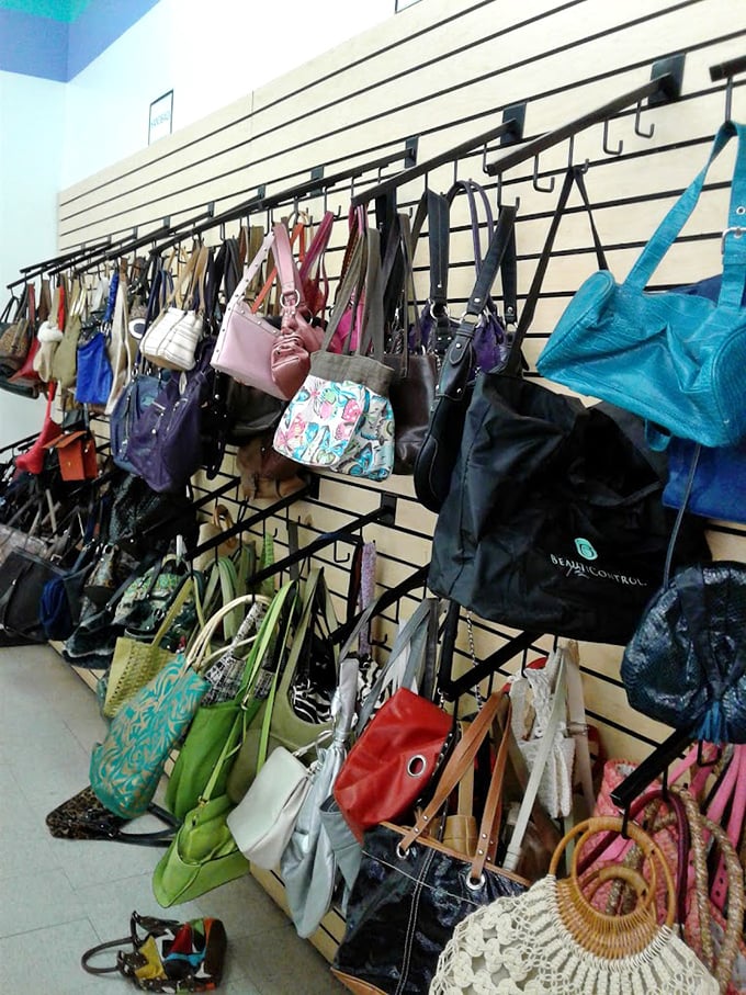 Handbag heaven hanging on the wall. From practical totes to statement purses, this is where accessory dreams come true without the designer price tag.