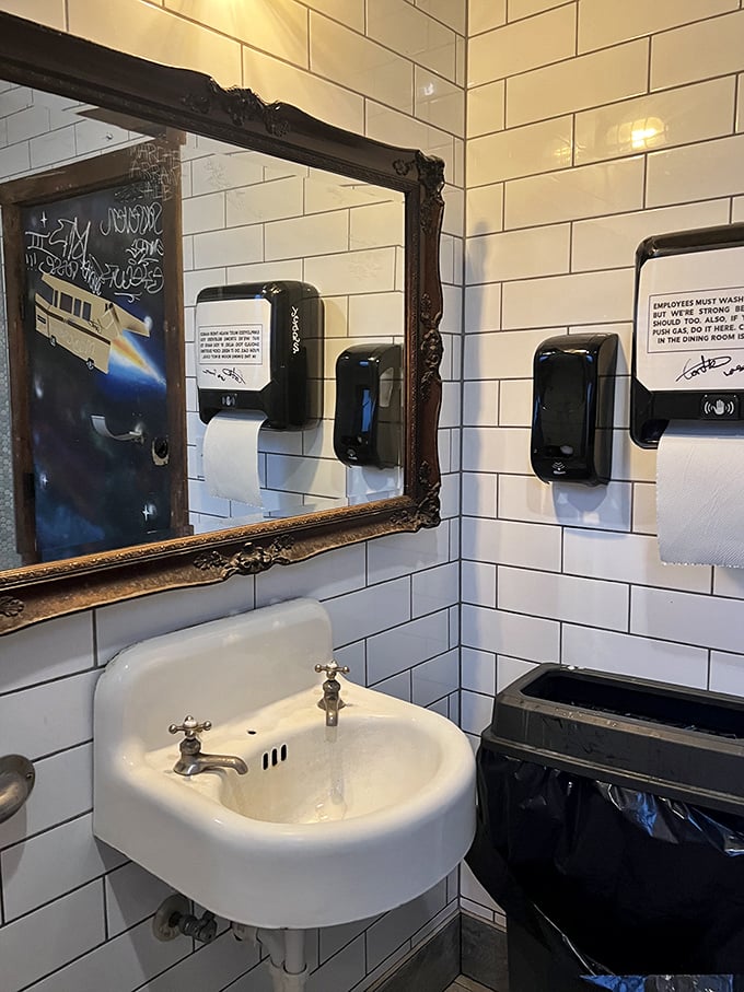 Even the bathroom brings the charm with its ornate mirror frame—because at Moo & Brew, style extends to every corner.