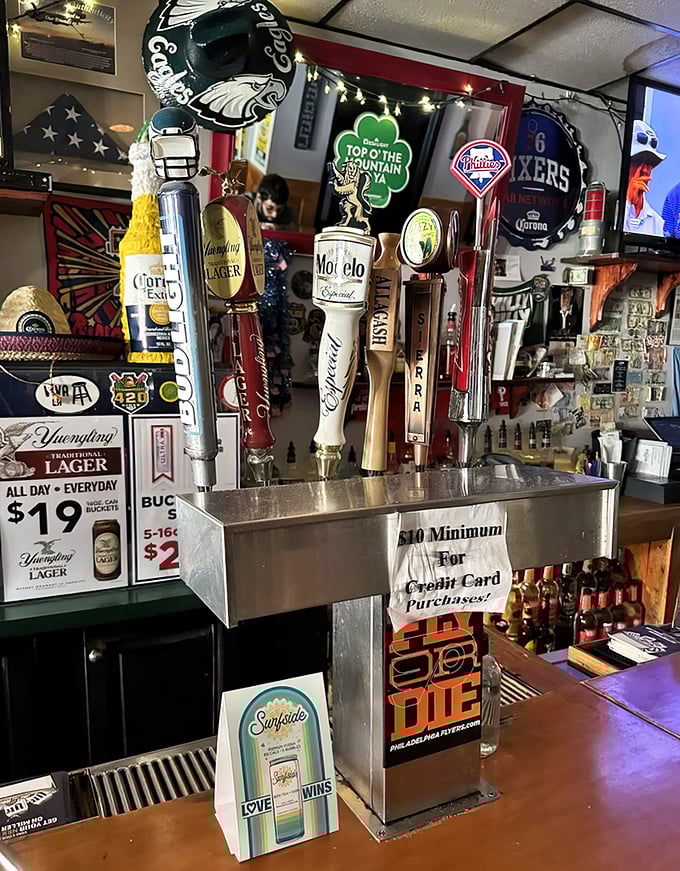 Beer taps standing at attention like loyal soldiers, ready to serve the perfect companion to Philadelphia's finest roast beef.