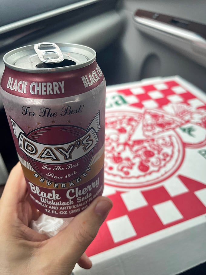 The perfect pairing: Black cherry soda and a checkered pizza box. Some traditions are worth preserving in their original glory.