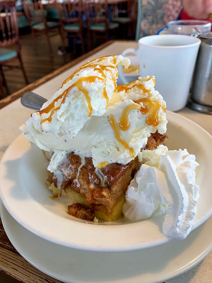 Bread pudding topped with enough whipped cream to make your cardiologist wince but your soul sing with unbridled joy.