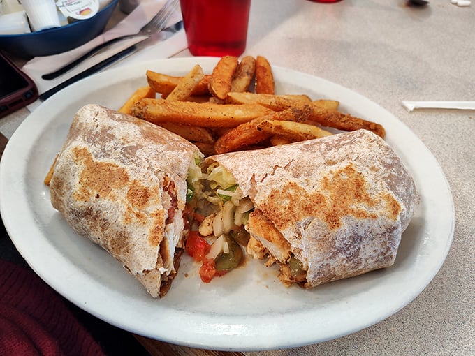 This isn't just a wrap—it's a perfectly constructed handheld feast with a golden exterior hiding a treasure trove of savory fillings.