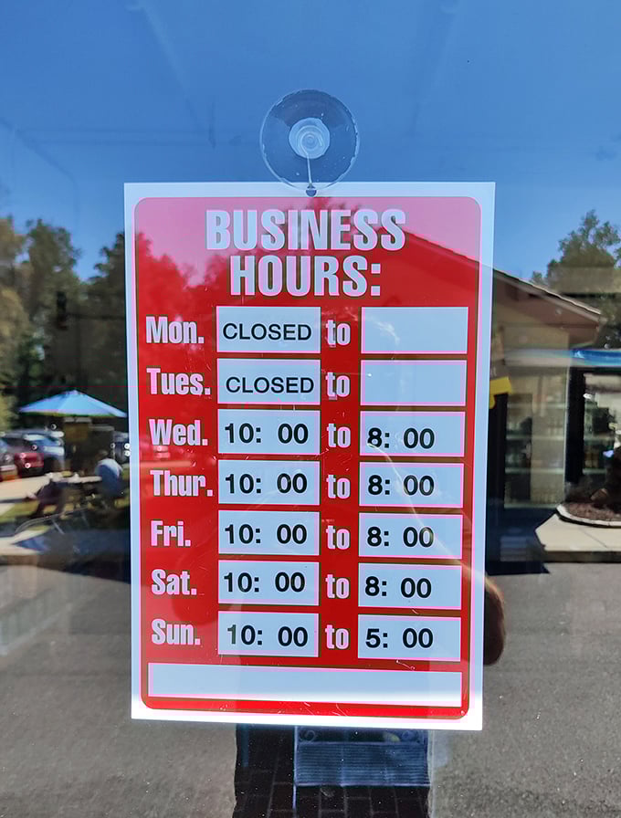 The business hours sign—a schedule that should be committed to memory like your children's birthdays.
