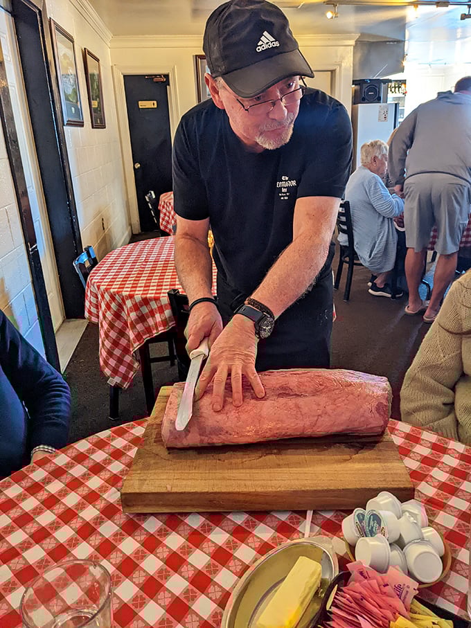 The tableside meat presentation isn't just service—it's theater where you get to direct the thickness of your own happiness.