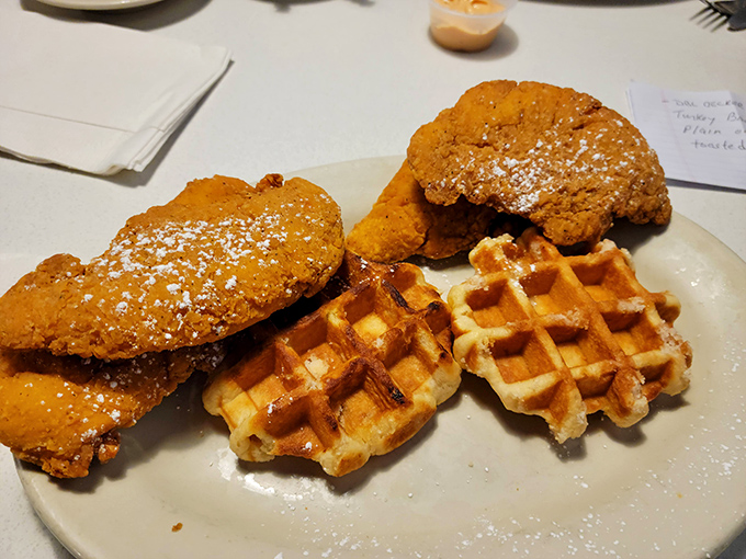 Chicken and waffles with a dusting of powdered sugar—breakfast, lunch, or dinner? Yes, absolutely, to all three.