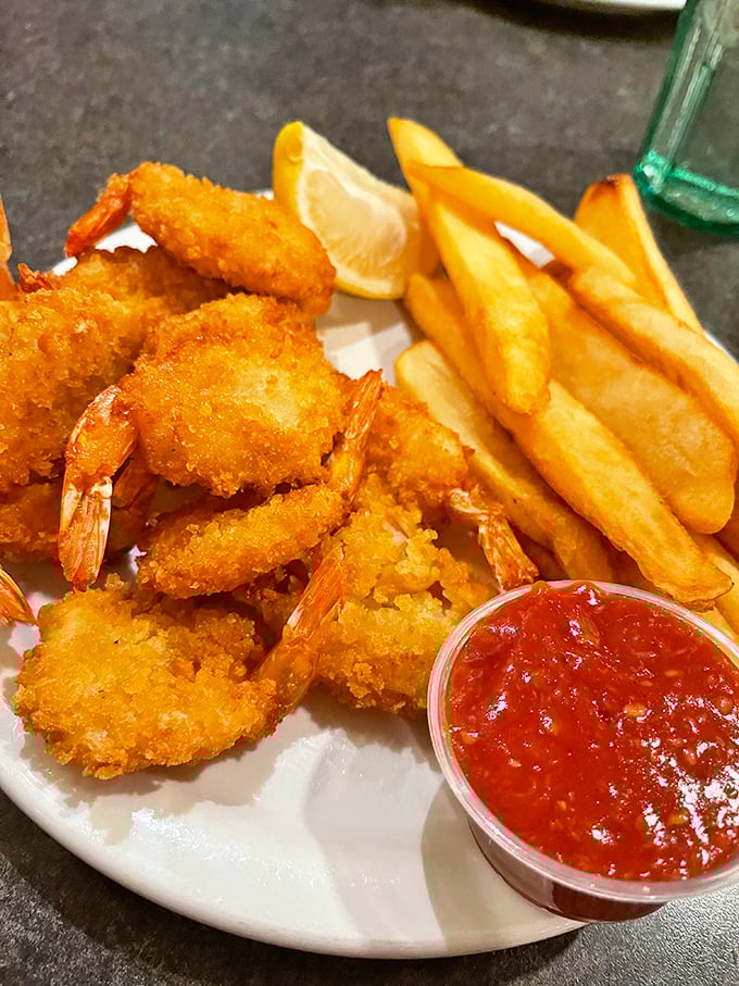 Fried shrimp that crunch like autumn leaves, served with fries and cocktail sauce—seafood that's traveled inland but hasn't forgotten its roots.