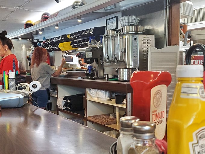 Behind the scenes, where the magic happens – Clyde's kitchen staff works with practiced efficiency to keep hungry customers satisfied.