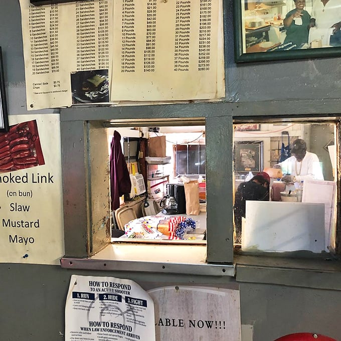 The ordering window – that magical portal where your barbecue dreams are transformed into foil-wrapped reality by the keepers of smoke and flame.