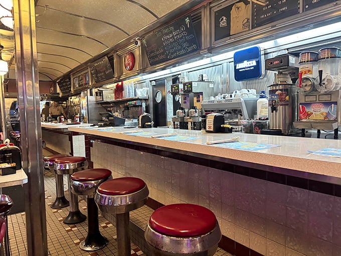 The counter seating – where solo diners become temporary members of the most delicious club in Miami Beach, complete with front-row kitchen views.