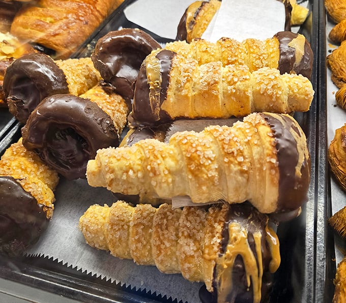 Cream horns that make you understand why unicorns are mythical—if they existed, they'd have eaten all of these magical pastries long ago.