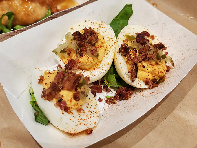 Deviled eggs topped with bacon crumbles aren't just appetizers—they're proof that sometimes the simplest pleasures deliver the most profound joy.
