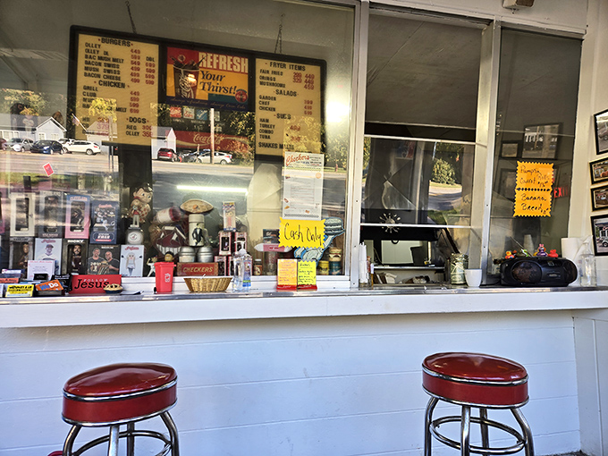 The counter view—where anticipation builds as you watch your order being prepared and the aroma of grilling burgers fills the air.