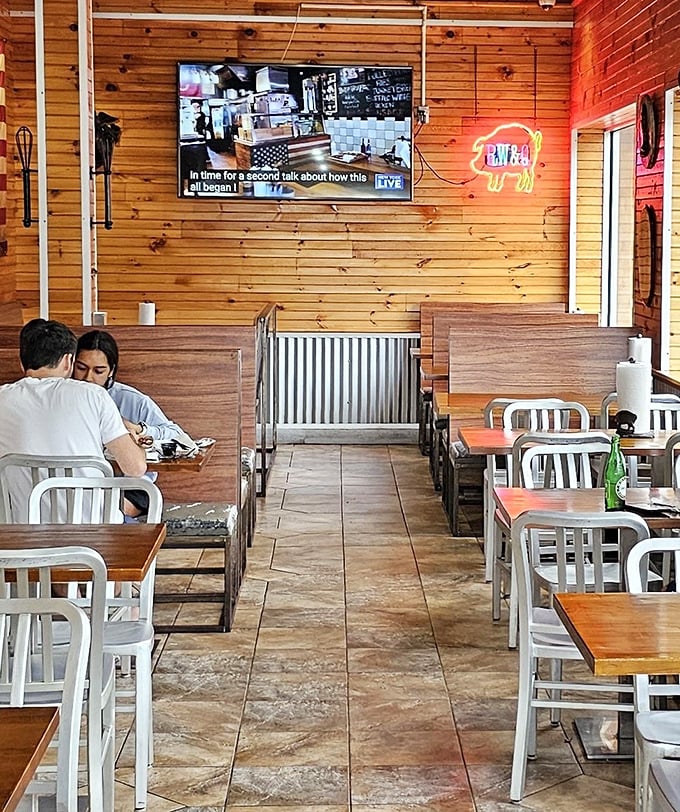The universal language of barbecue – heads bowed in respect to the food before them. A moment of silent appreciation before the feast begins.