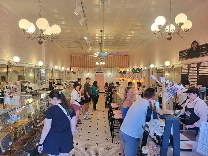 The line forms for a reason—some things are worth waiting for. Customers patiently anticipate their turn at the counter where memories are served alongside desserts.