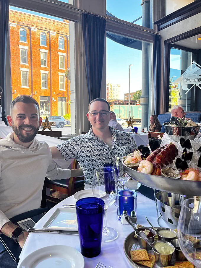 The look of pure joy when the seafood tower arrives. Some moments deserve to be immortalized—this tower of oceanic treasures is definitely one of them.