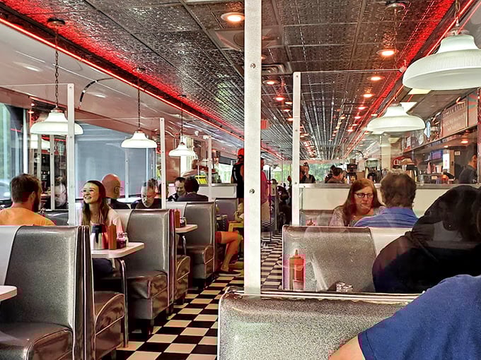 The diner's interior buzzes with conversation and clinking silverware—a symphony of satisfaction conducted by hunger.