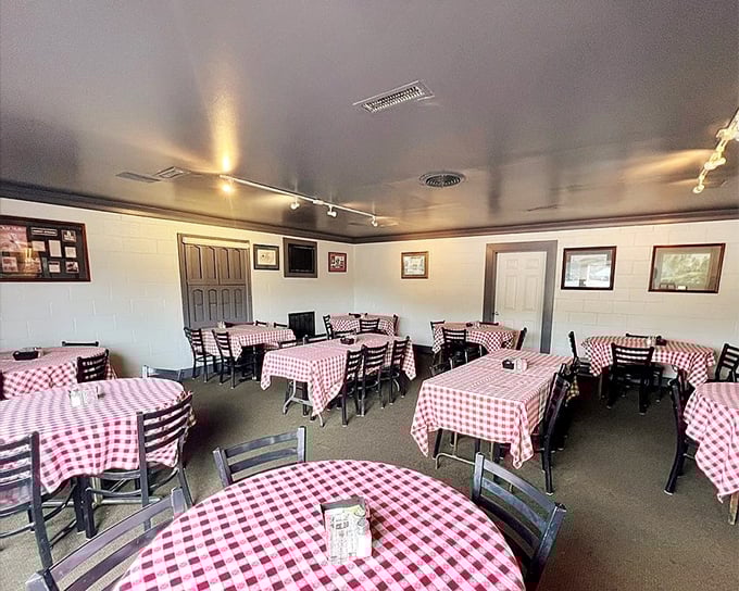 The dining room waits expectantly for the evening's guests. Each checkered table represents a family about to create a memory around exceptional food.