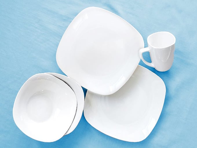 Elegant white dinnerware that whispers "sophisticated dinner party" while your budget quietly sighs with relief.