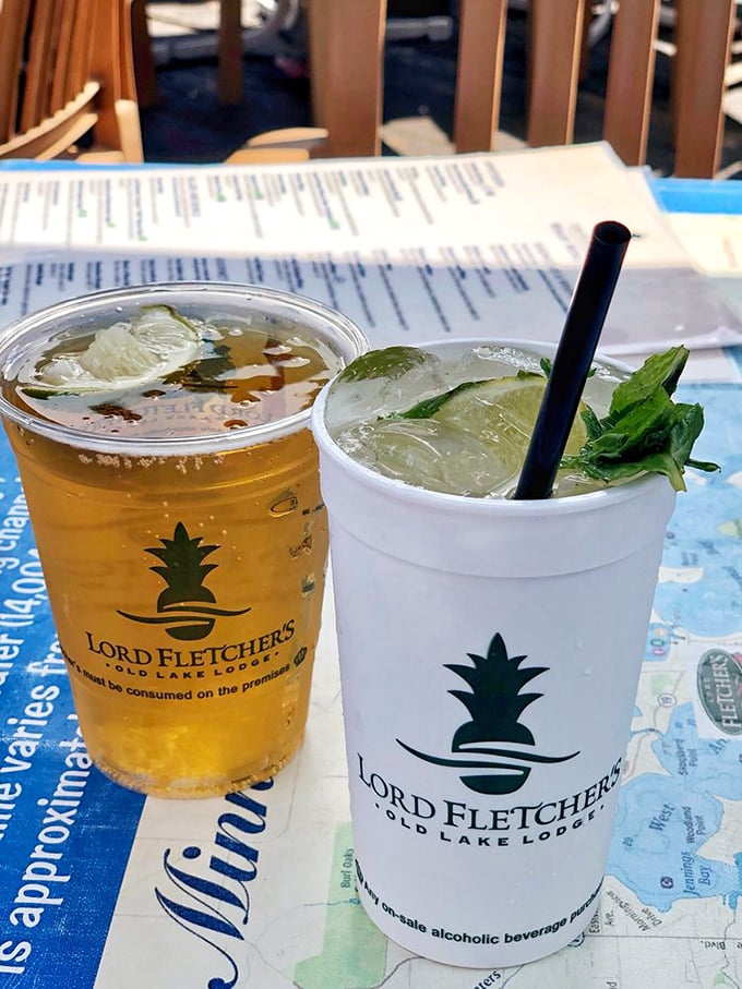 Lord Fletcher's signature drinks—where refreshment meets lakeside views in plastic cups that somehow make everything taste better on a hot Minnesota day.