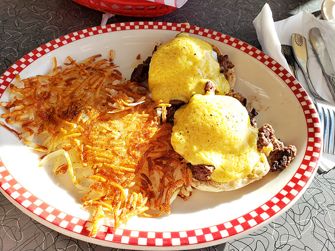 Eggs Benedict with perfectly crisp hashbrowns – the kind of breakfast that makes you want to high-five the chef and take a nap.