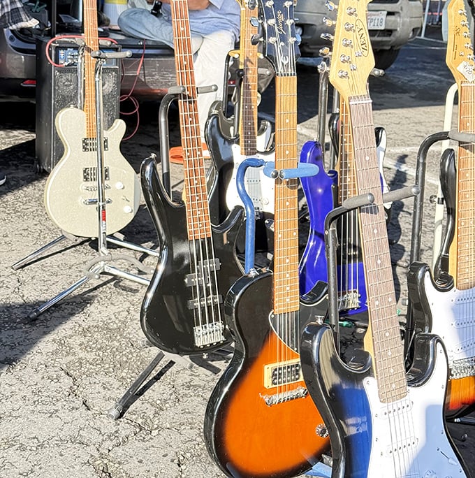 Electric guitars and basses in sunset orange and electric blue await the musician who refuses to pay retail for their dreams.