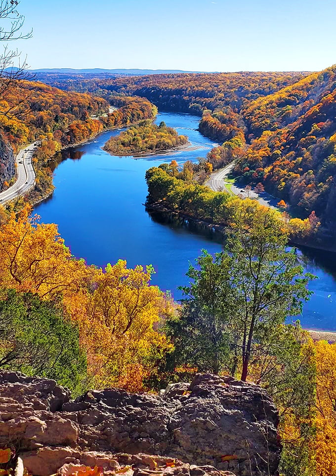The river wrote its signature across the landscape in flowing blue ink. Some autographs are worth the climb.