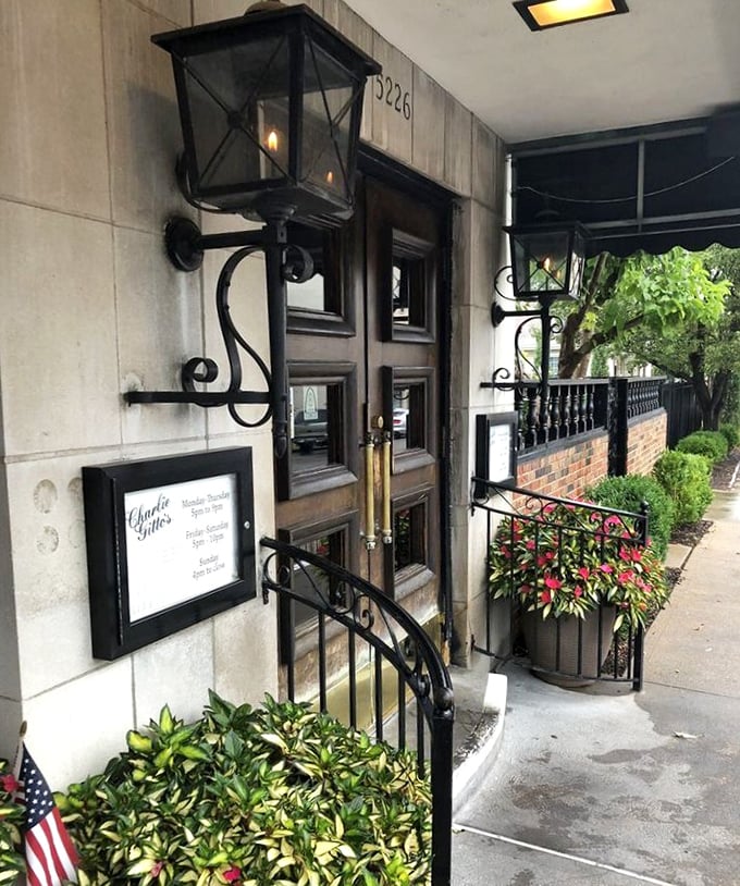 The entrance beckons with old-world charm—wrought iron, warm lighting, and the promise that inside, calories don't count and time stands still.