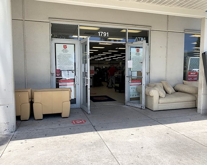 Even the entrance offers a preview of treasures within—those cream sofas outside are just appetizers for the furniture feast that awaits inside.