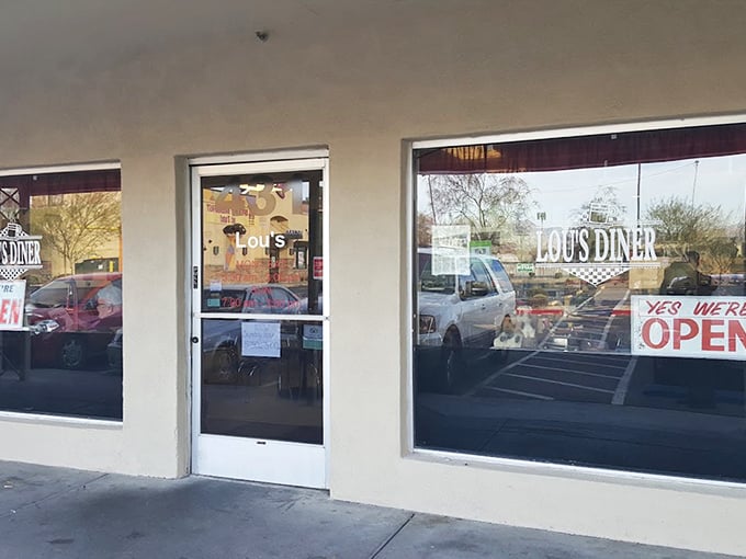 "Yes We're Open"—three beautiful words on Lou's entrance, promising refuge from both hunger and Las Vegas's relentless desert sun.